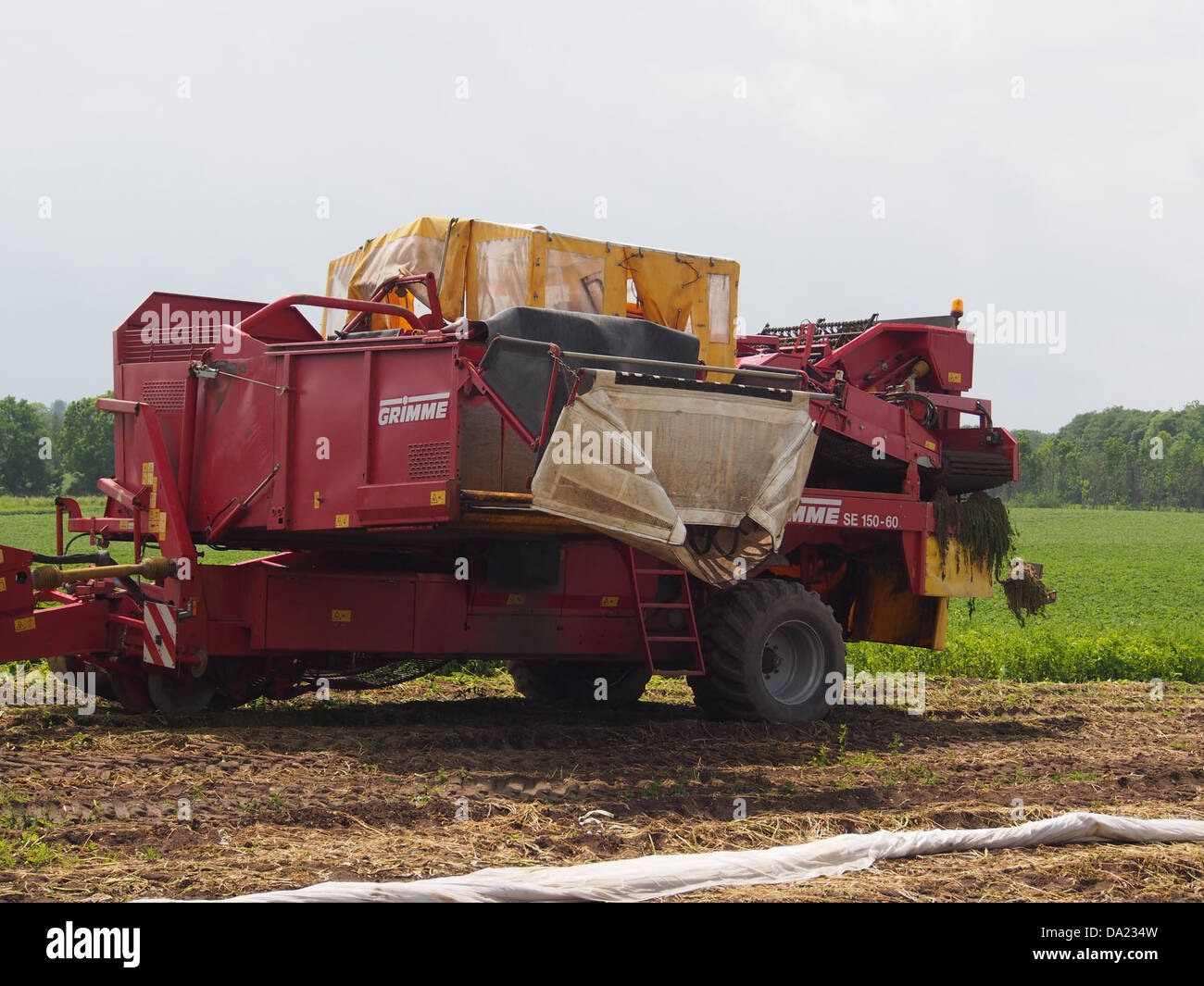 The GRIMME SE 150-60 is a high-performance agricultural machine ...
