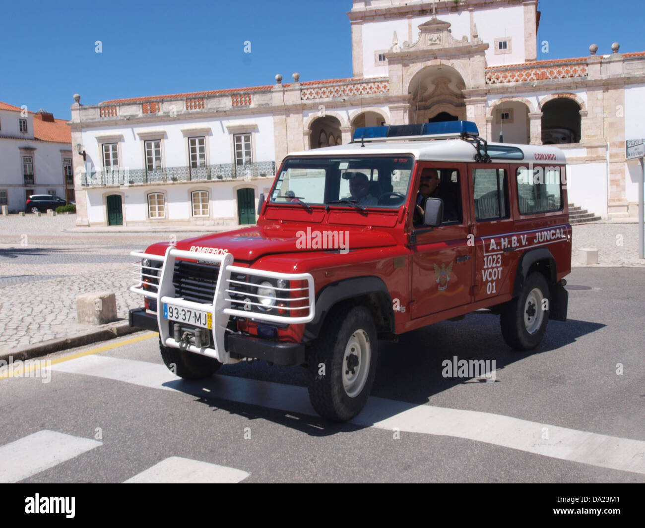 The image features a Land Rover Defender used by the military ...