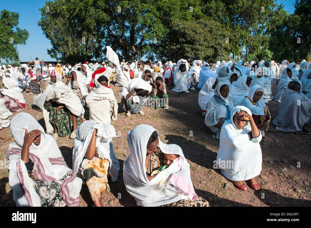 Pilgrims with the traditional white shawl attending a ceremony at the ...
