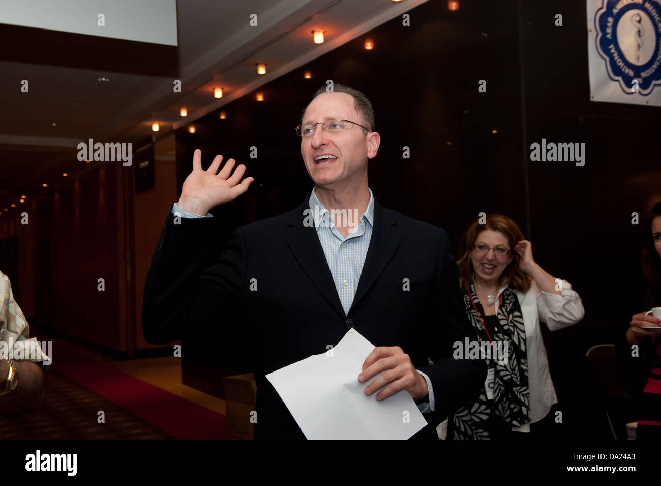 Dr. Elie Azrak, President of NAAMA speaking at the opening ceremony of ...