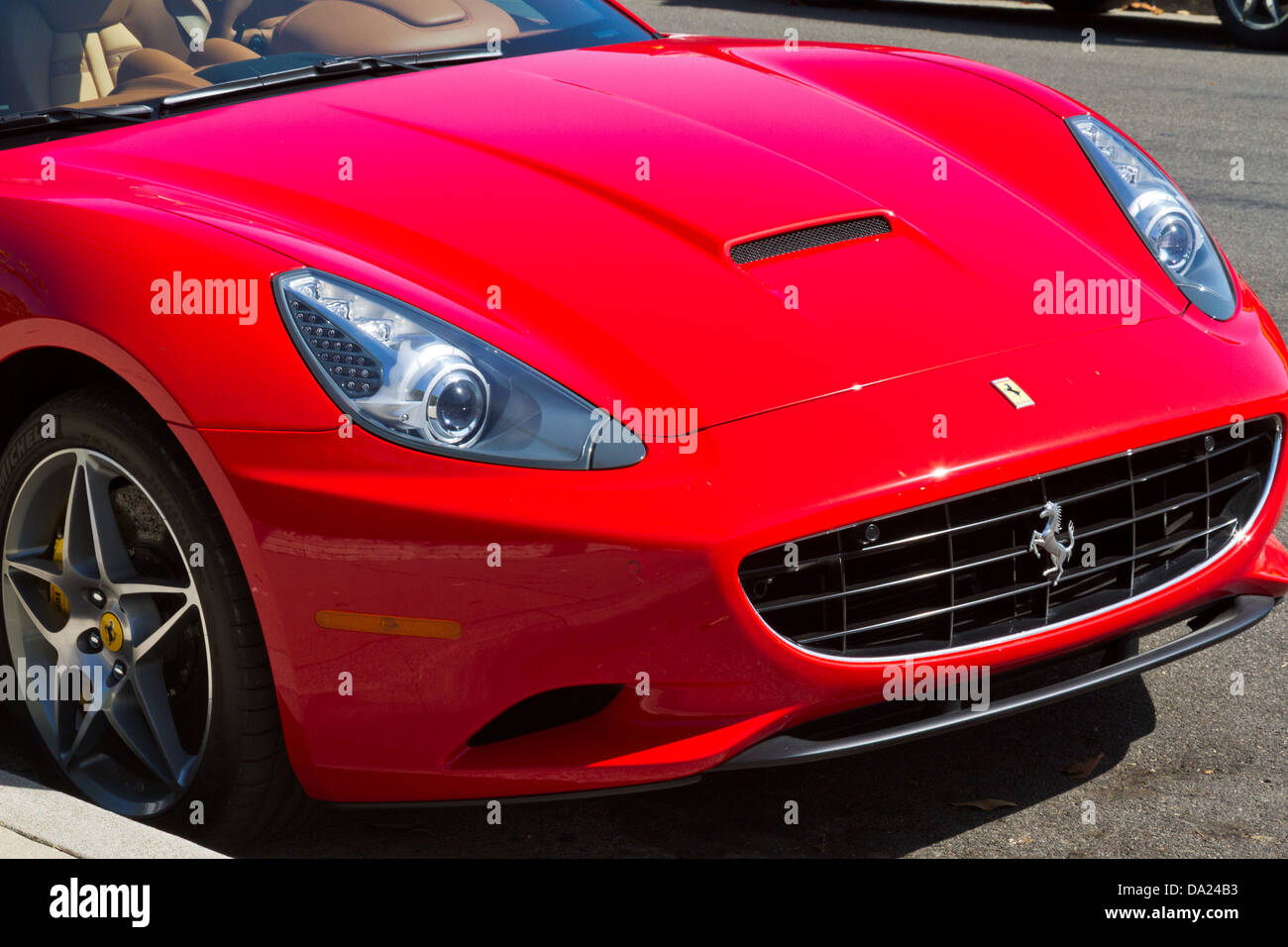 Bright red Ferrari California parked on street Stock Photo - Alamy