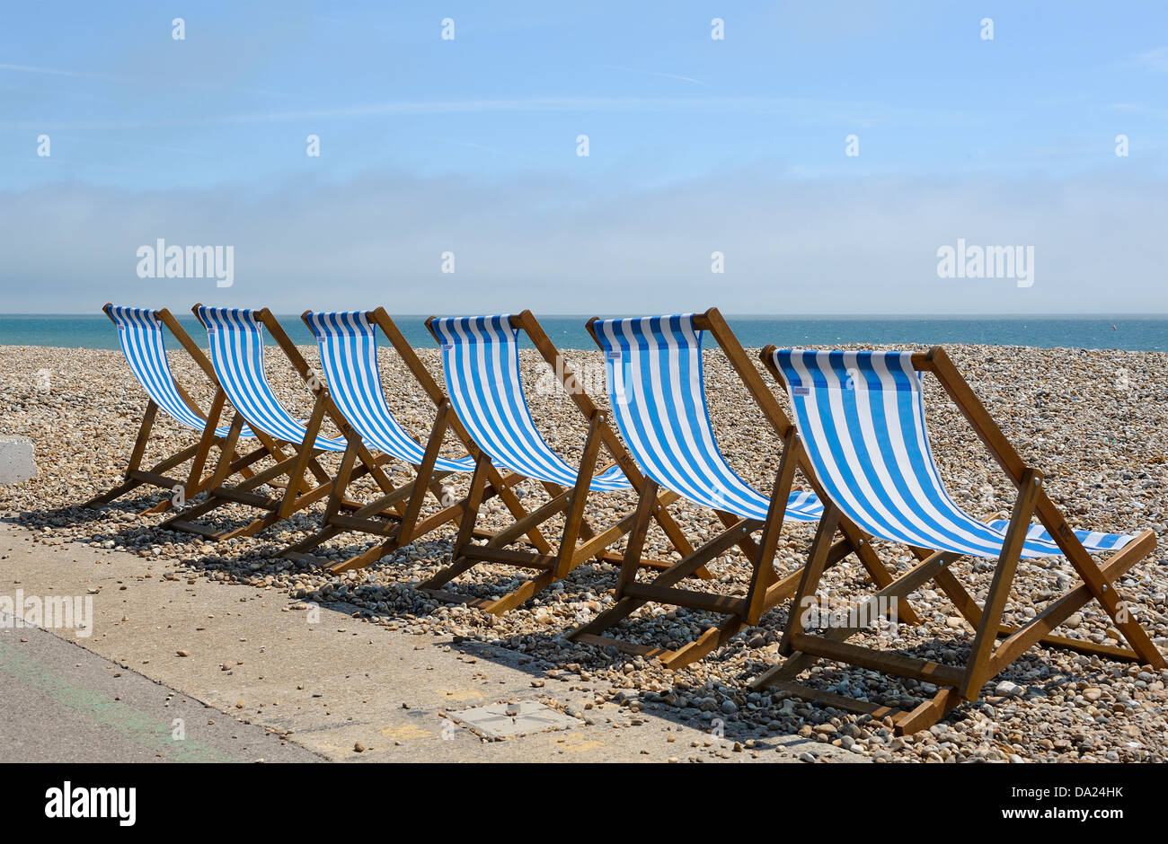 Deck chair on beach hi-res stock photography and images - Alamy