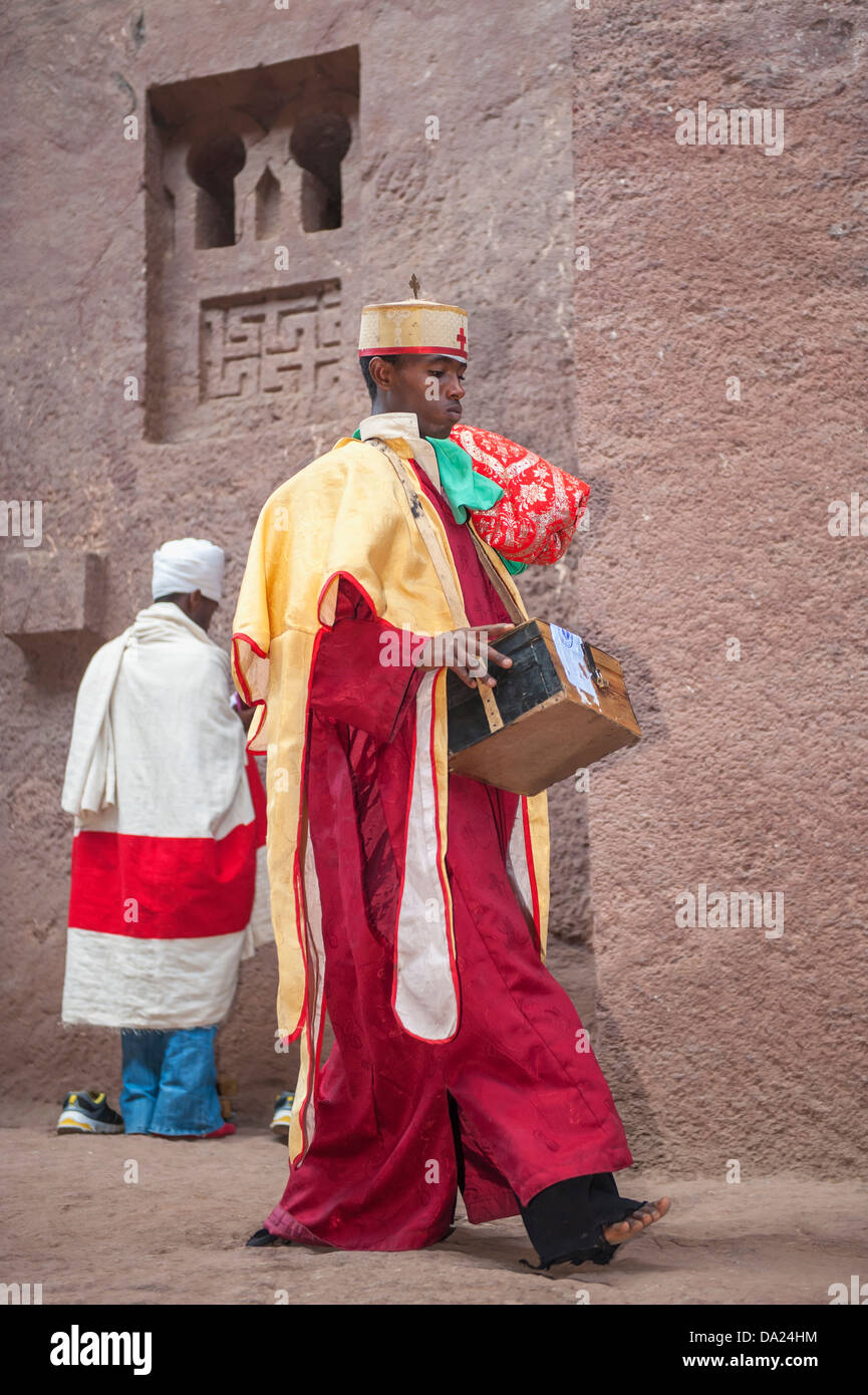 Priest holding relics from the Bete Medhane Alem Church, Lalibela ...