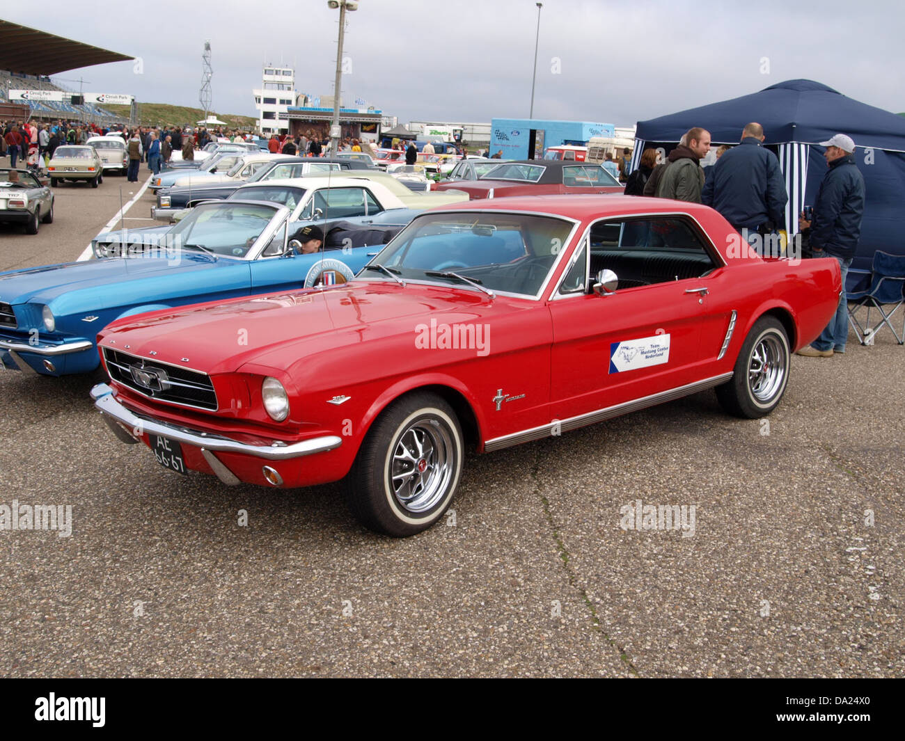 The 1965 Ford Mustang, featured in this image, is a classic American ...
