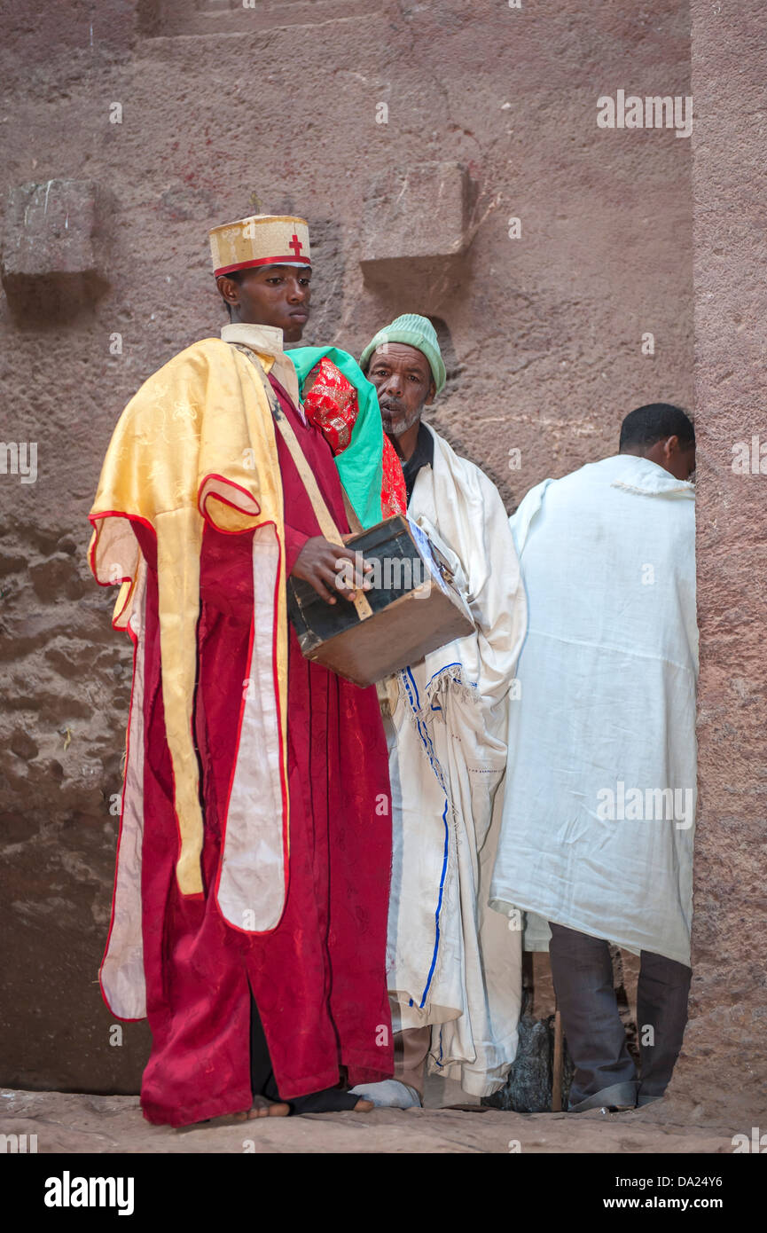 Priest holding relics from the Bete Medhane Alem Church, Lalibela ...