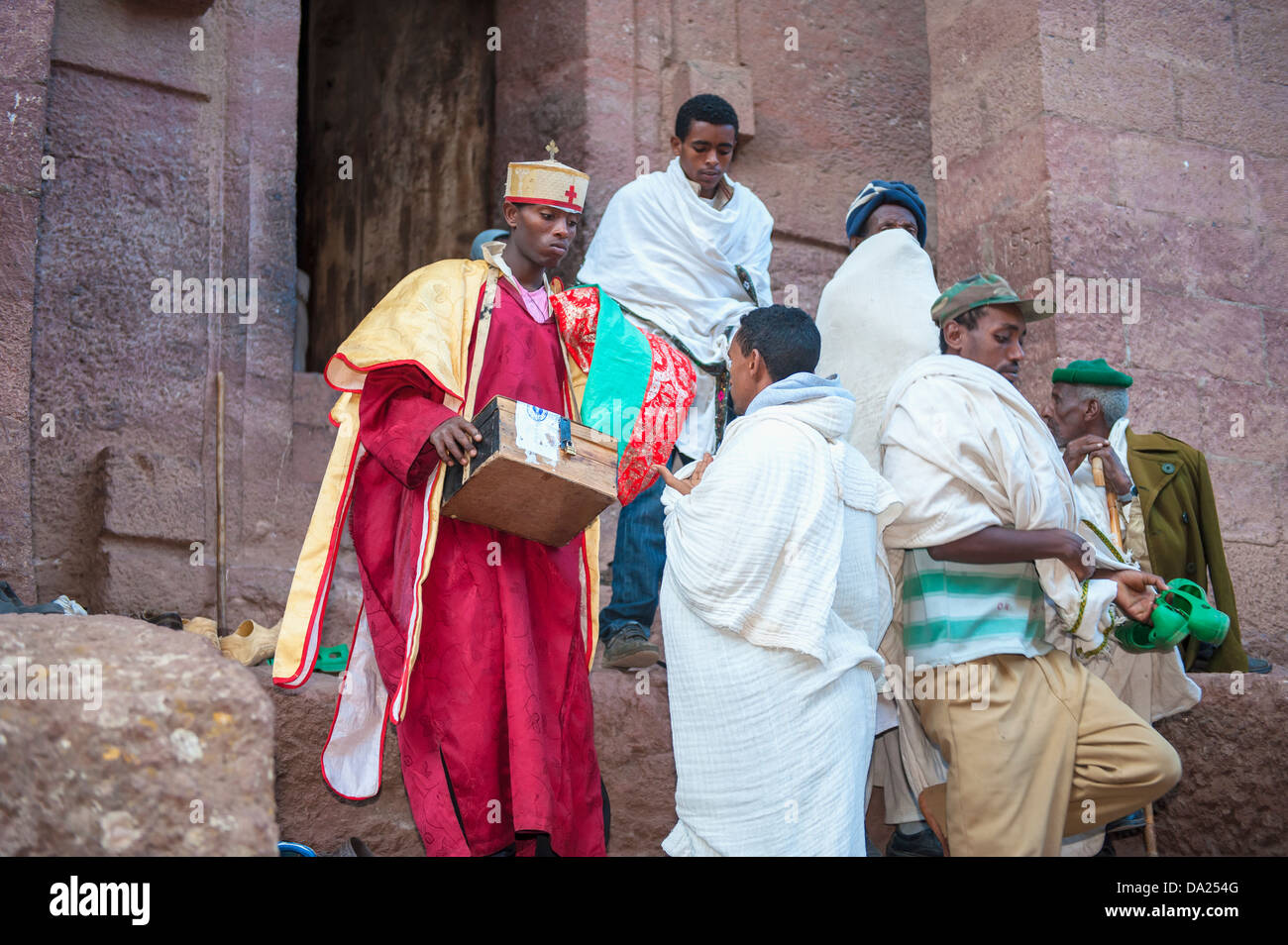 Priest holding relics from the Bete Medhane Alem Church, Lalibela ...