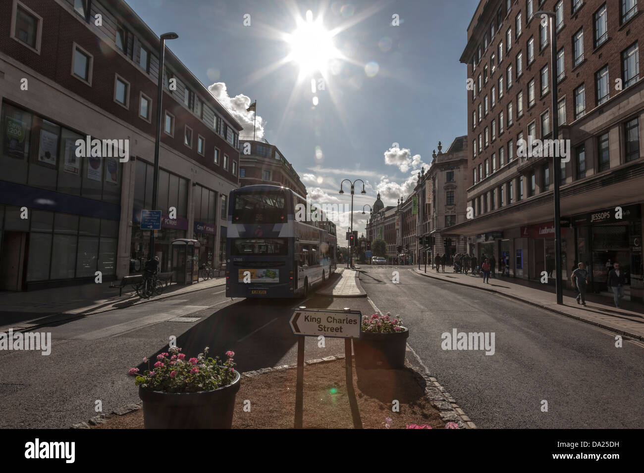 Leeds Headrow on a brightly sunlit day with strong shadow behind a bus ...