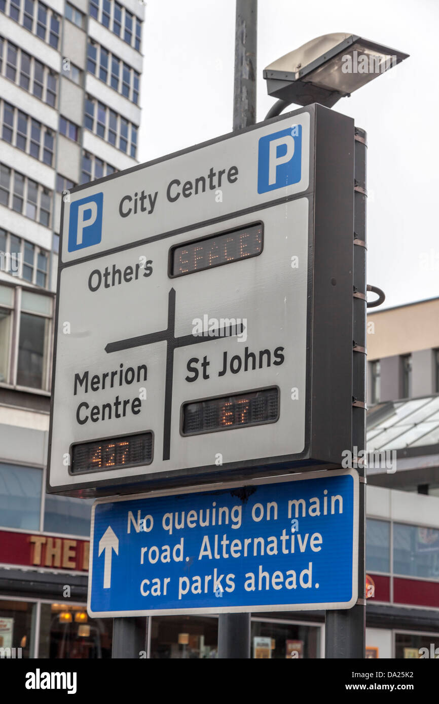 Car Parks direction sign showing two named car parks with figures for ...
