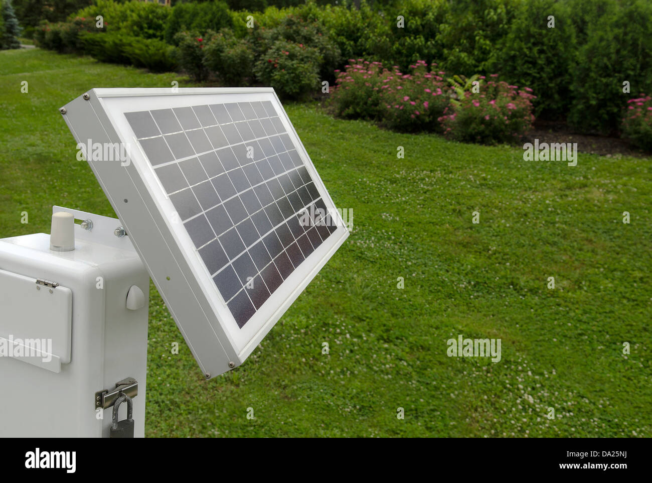 solar panel on residential lawn Stock Photo - Alamy