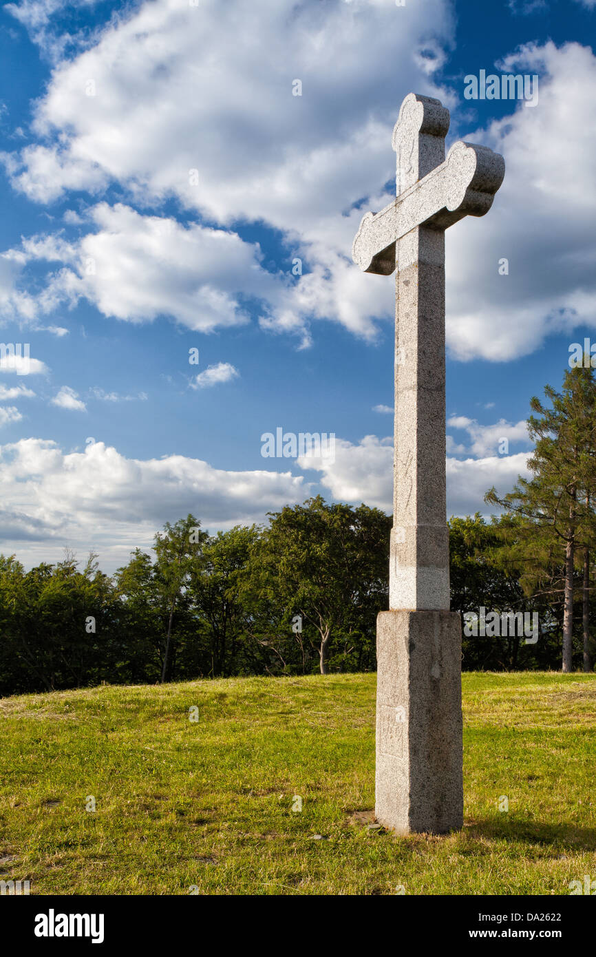 The stone cross on the place of pilgrimage Stock Photo - Alamy