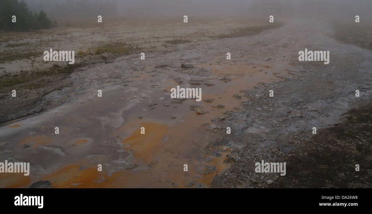 Dawn steam fog view orange bacterial mat overflow stream crossing grey ...