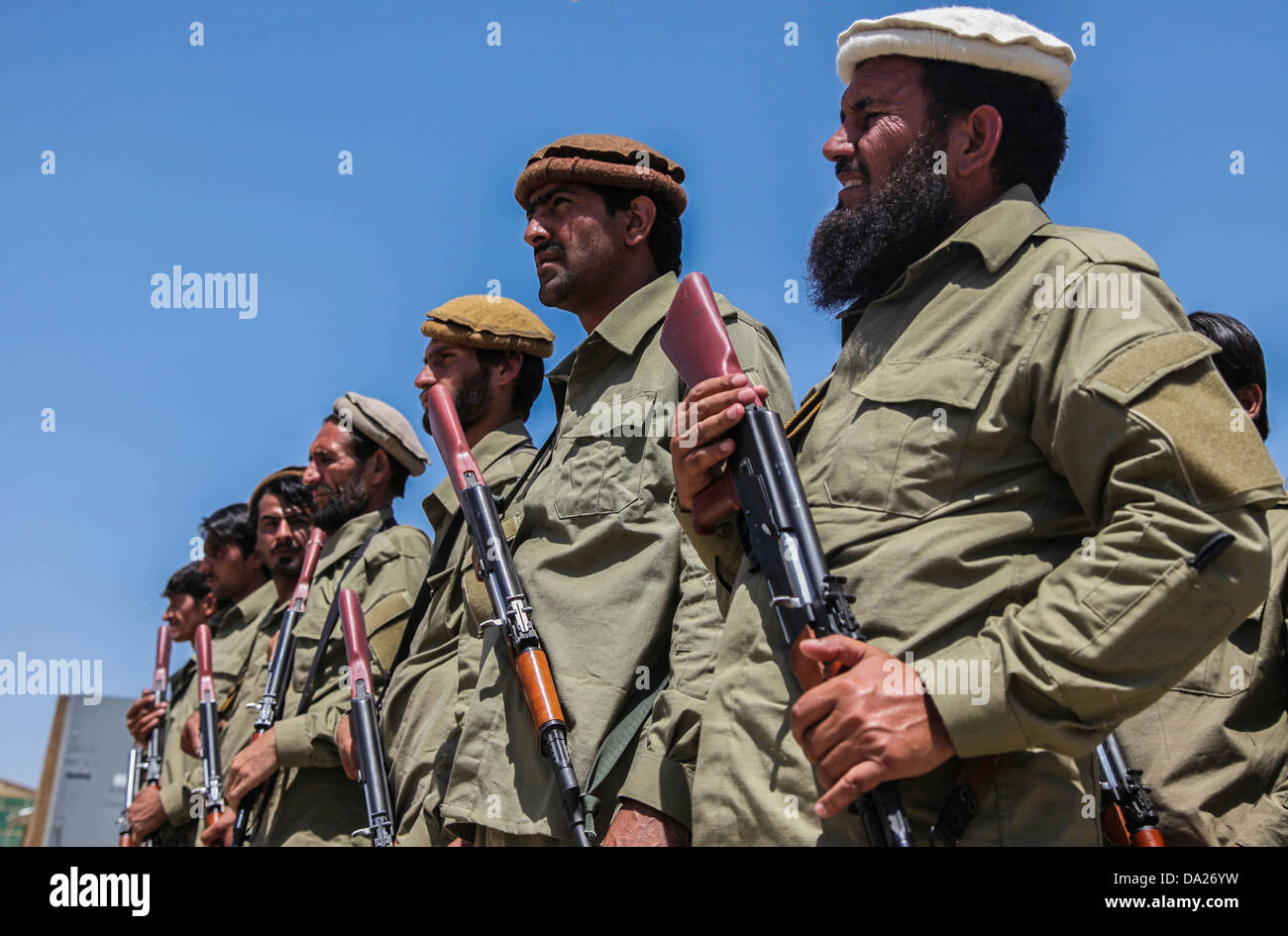 Members of an Afghan Local Police (ALP) stand in formation during an ...