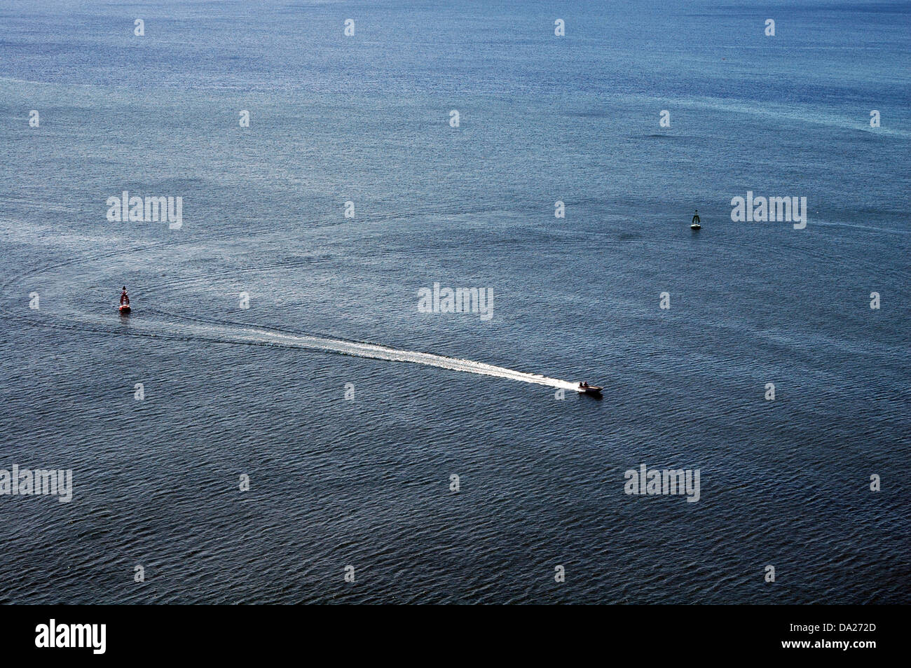 motorboat turning back on the ocean Stock Photo - Alamy