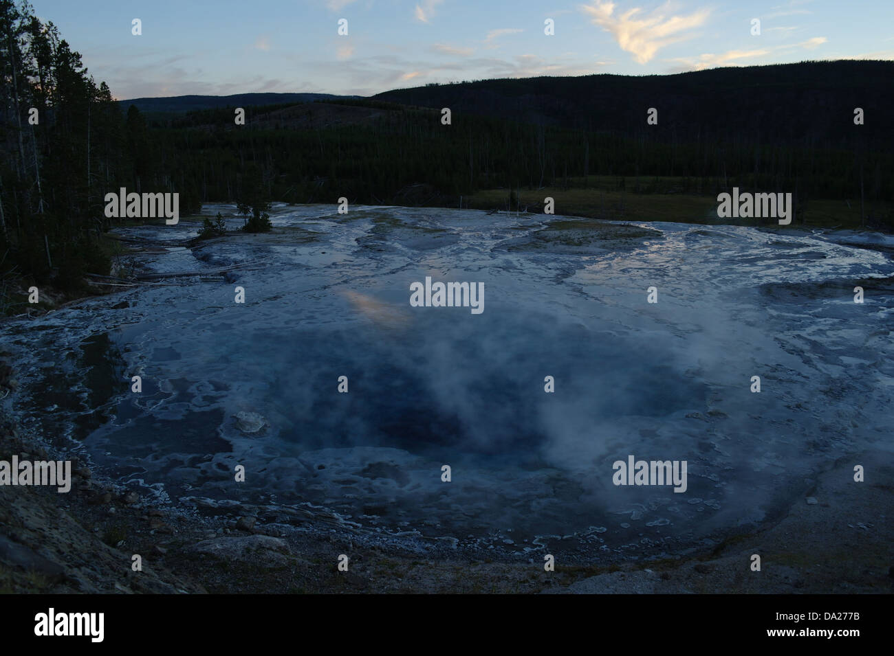 Sunset view Artemisia Geyser, with overflow streams flowing to Firehole ...