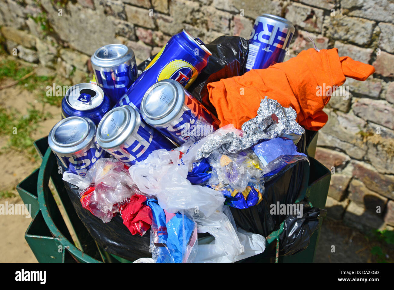 Overloaded rubbish bin by River Thames, Sunbury-on Thames, Surrey ...