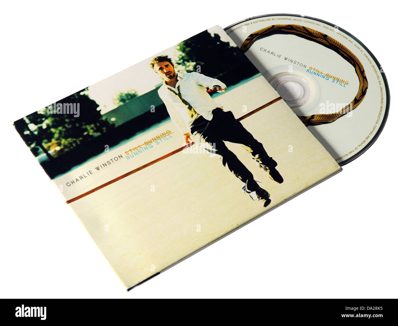 Charlie Winston Running Still album on CD Stock Photo - Alamy