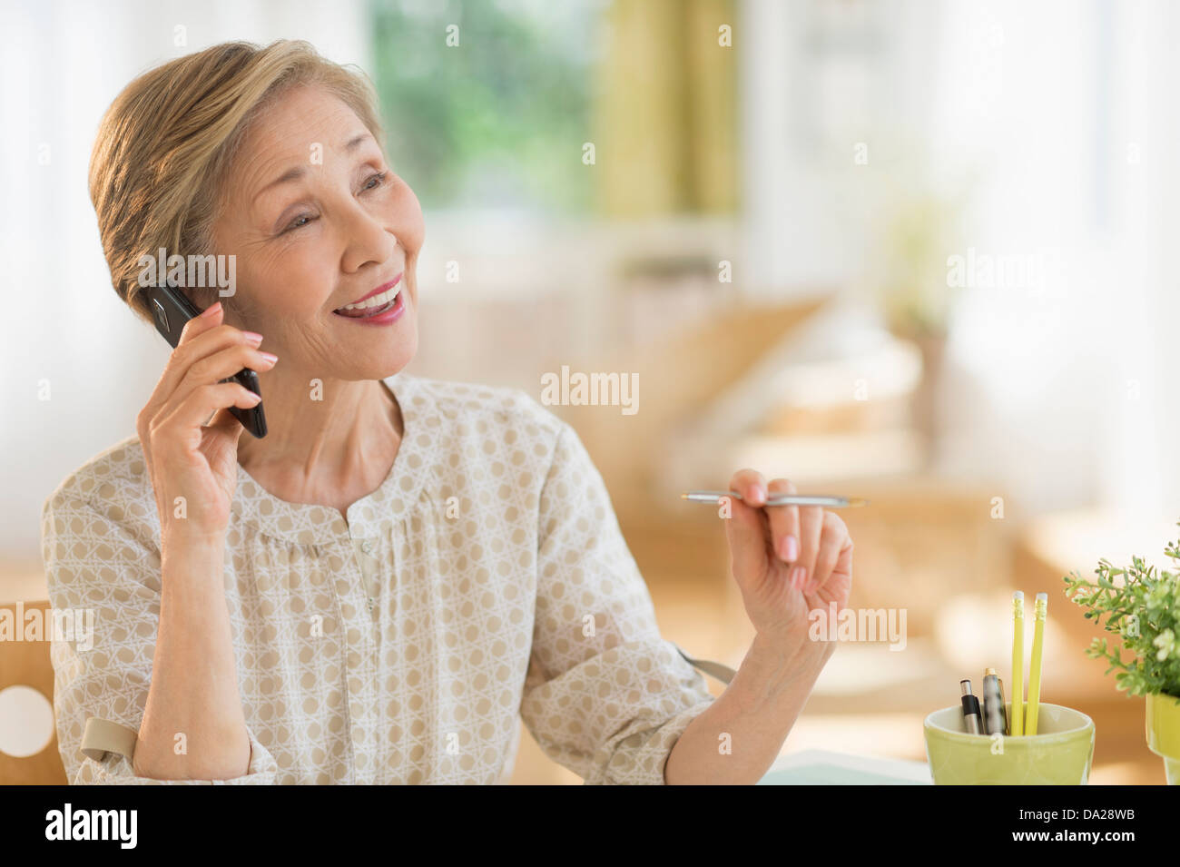 Senior woman talking on phone Stock Photo - Alamy
