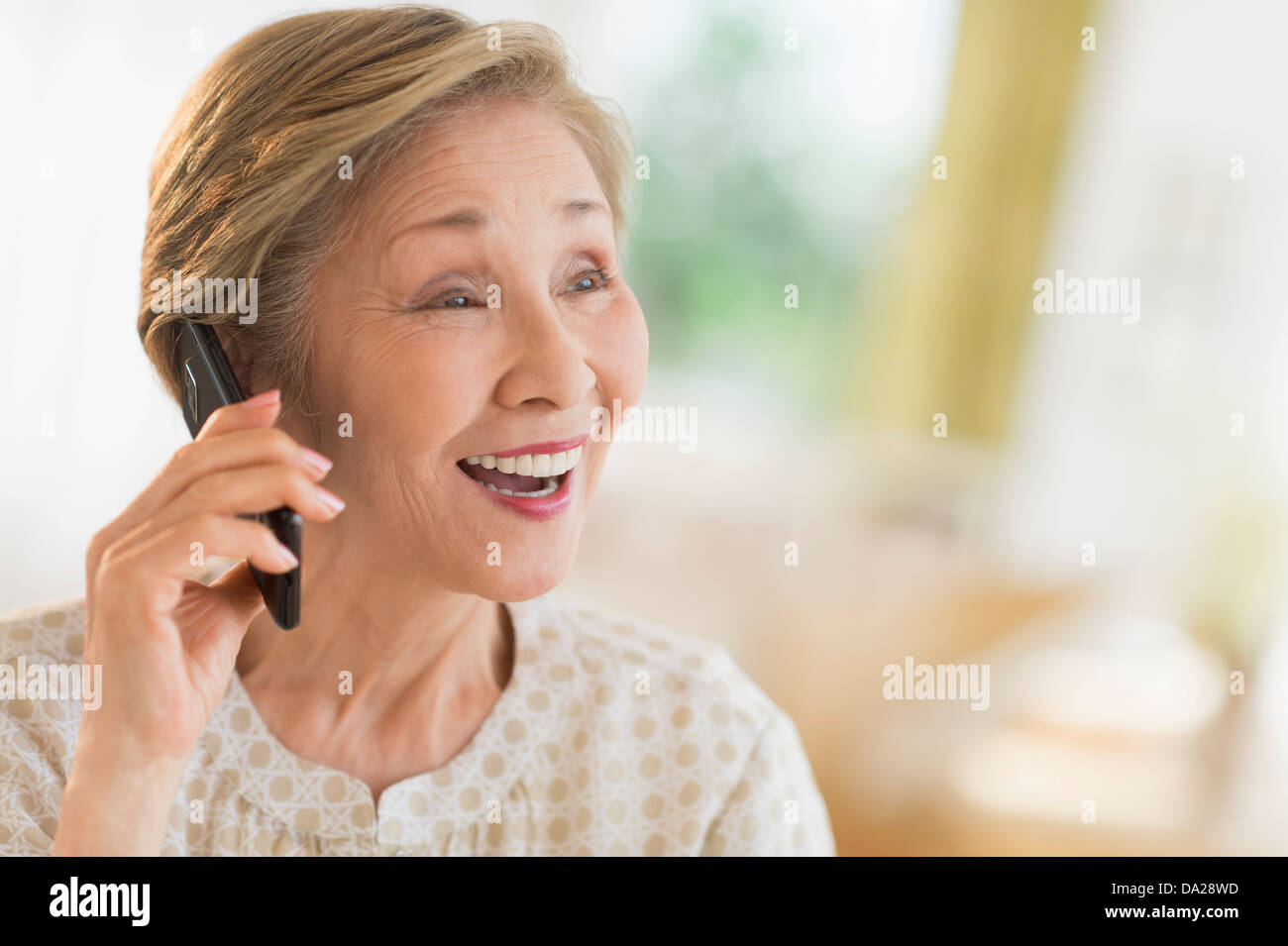 Senior woman talking on phone Stock Photo - Alamy