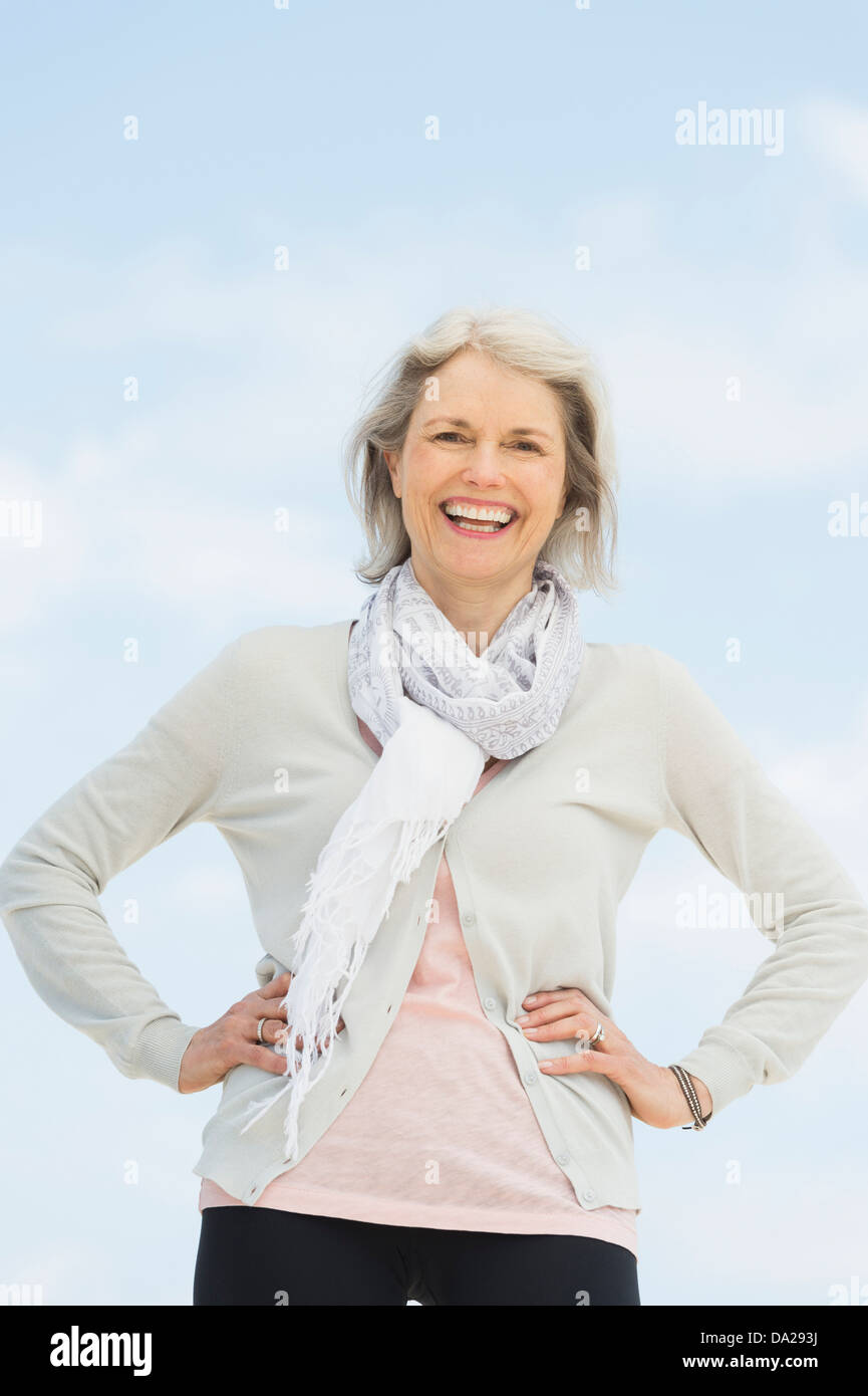 Portrait of senior woman standing outdoors Stock Photo - Alamy