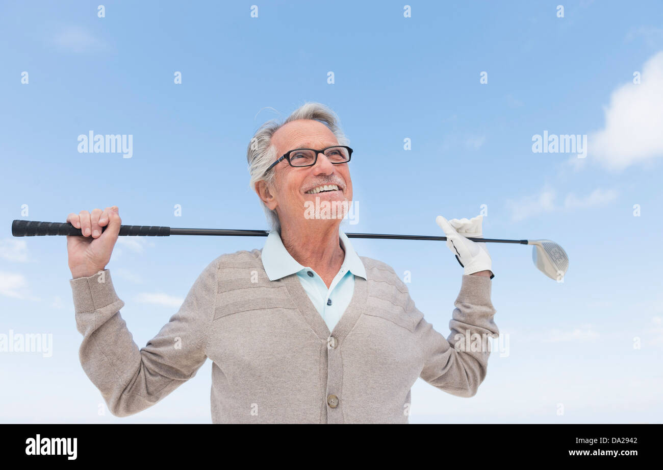 Golf man blue hi-res stock photography and images - Alamy