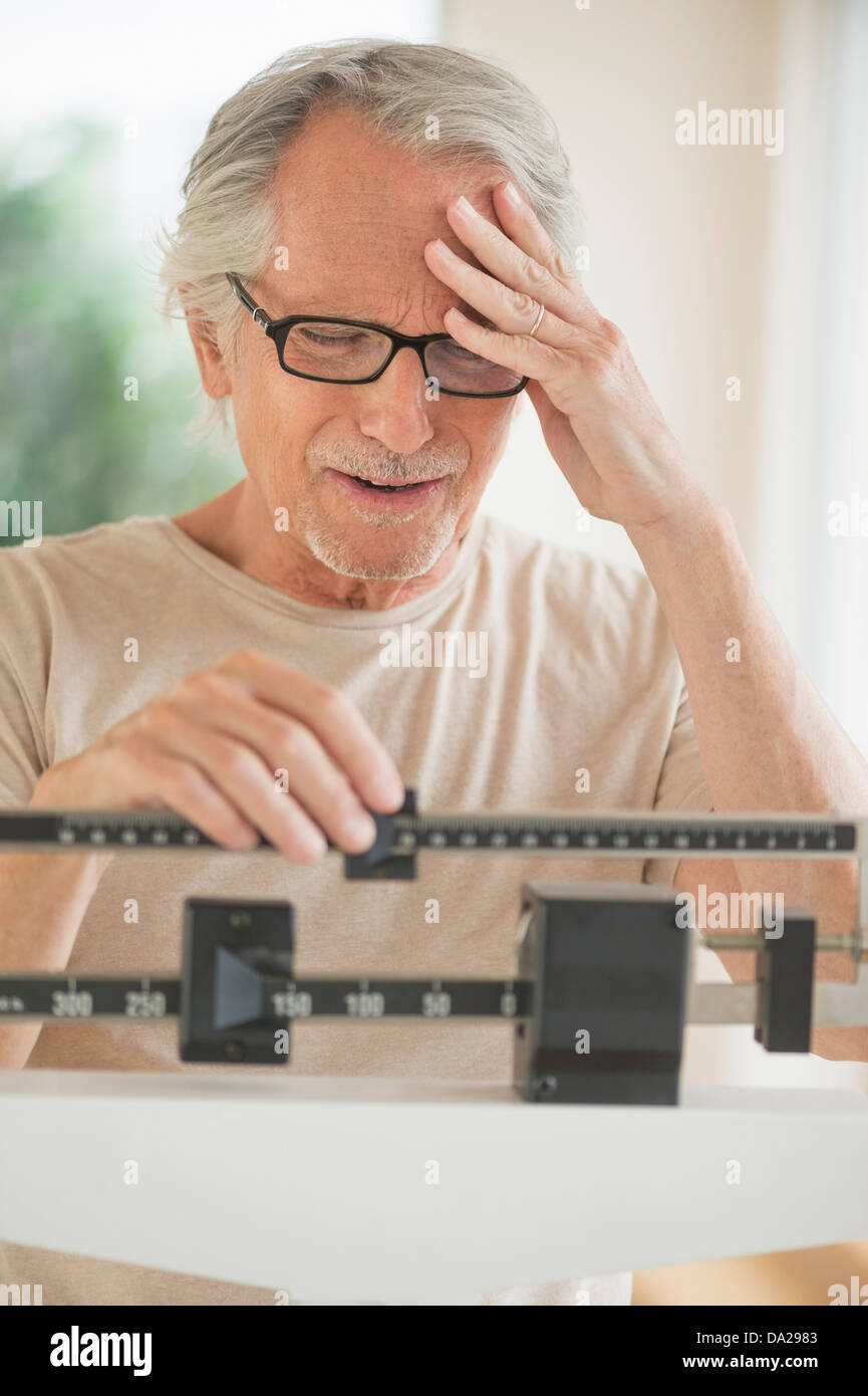 Man scale hi-res stock photography and images - Alamy