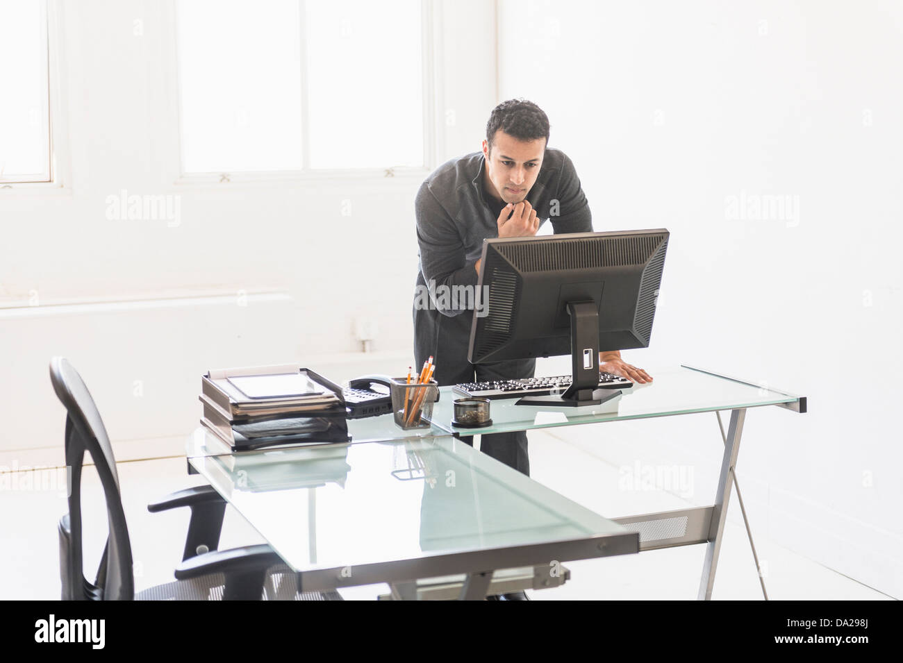 Man thinking at desk hi-res stock photography and images - Alamy