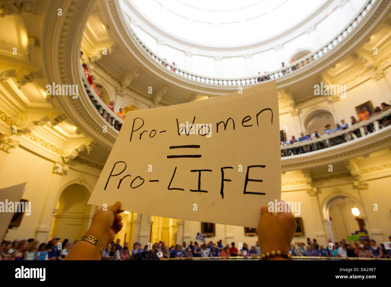 Hundreds of pro-life and pro-choice activists crowd inside the Texas ...