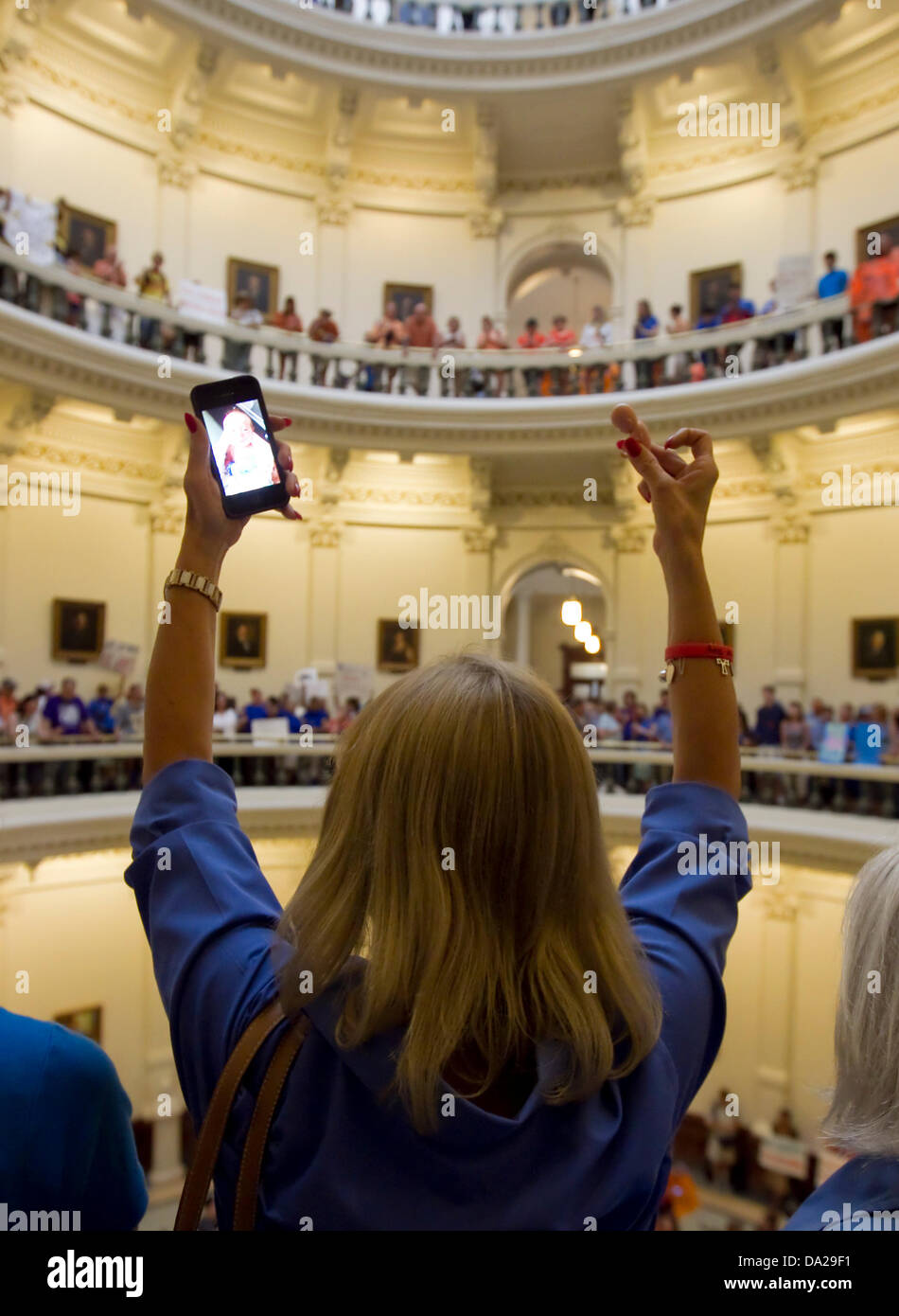 Hundreds of pro-life and pro-choice activists crowd inside the Texas ...