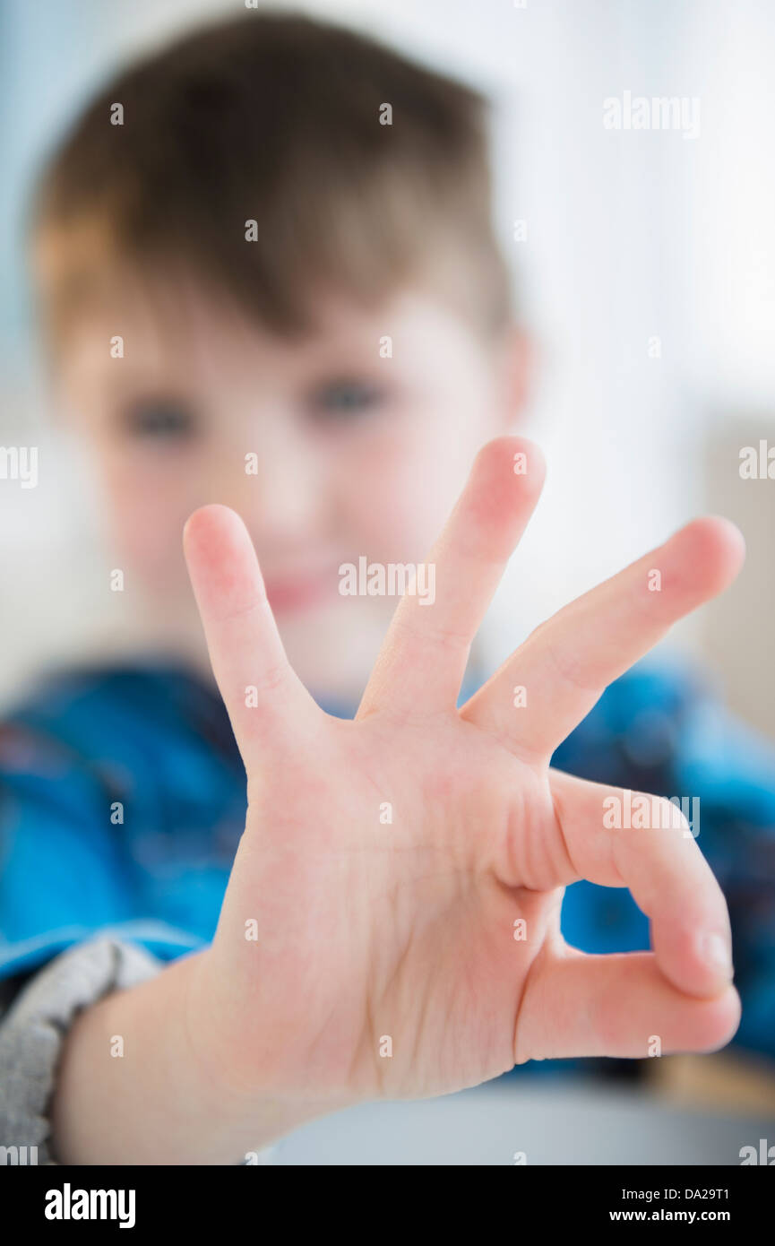 Boys hand gesture hi-res stock photography and images - Alamy