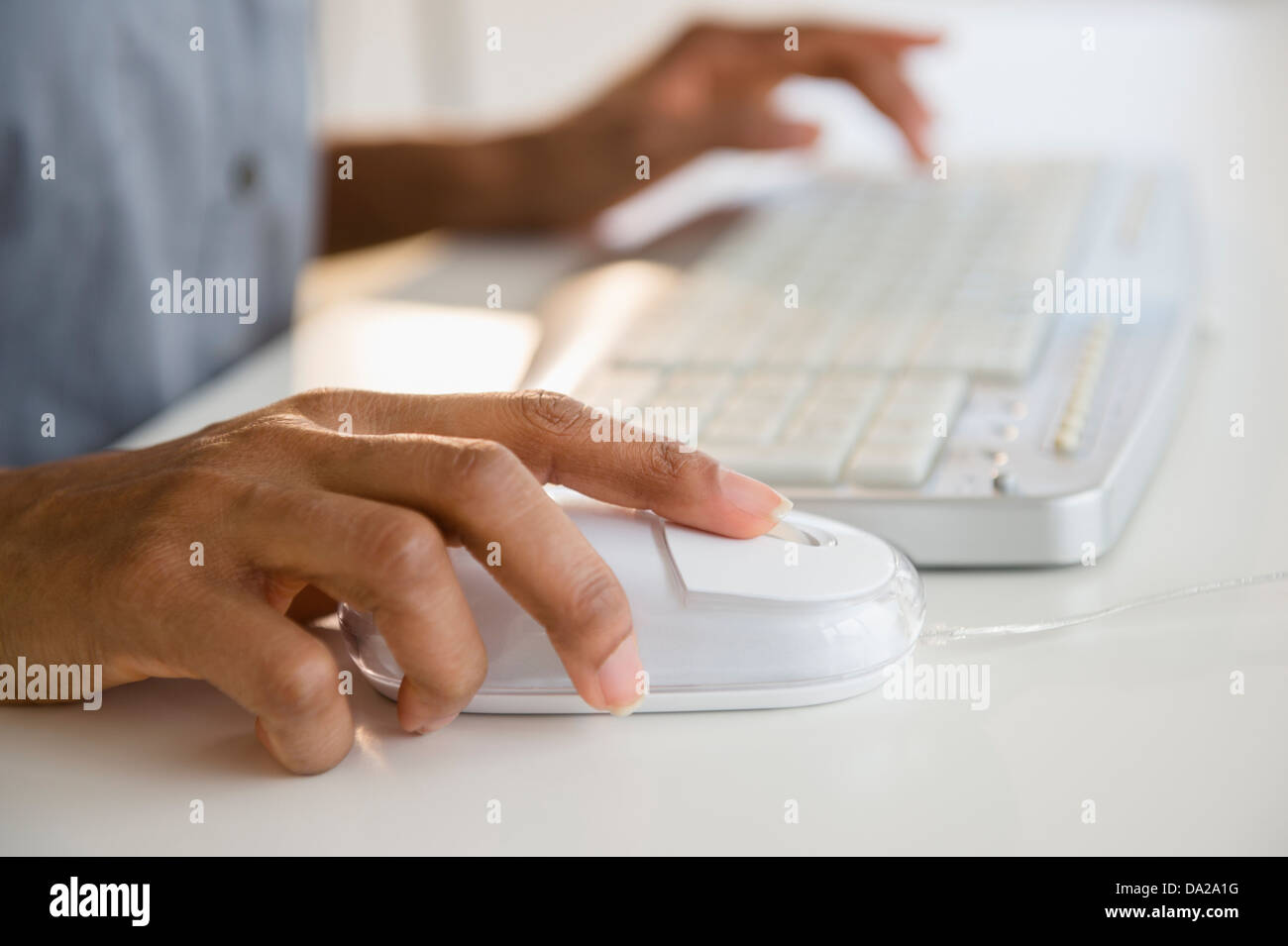 Woman hand on computer mouse hi-res stock photography and images - Alamy