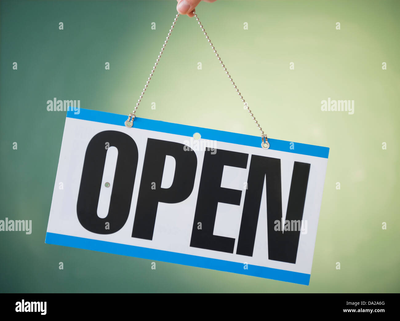 Human hand holding open hi-res stock photography and images - Alamy