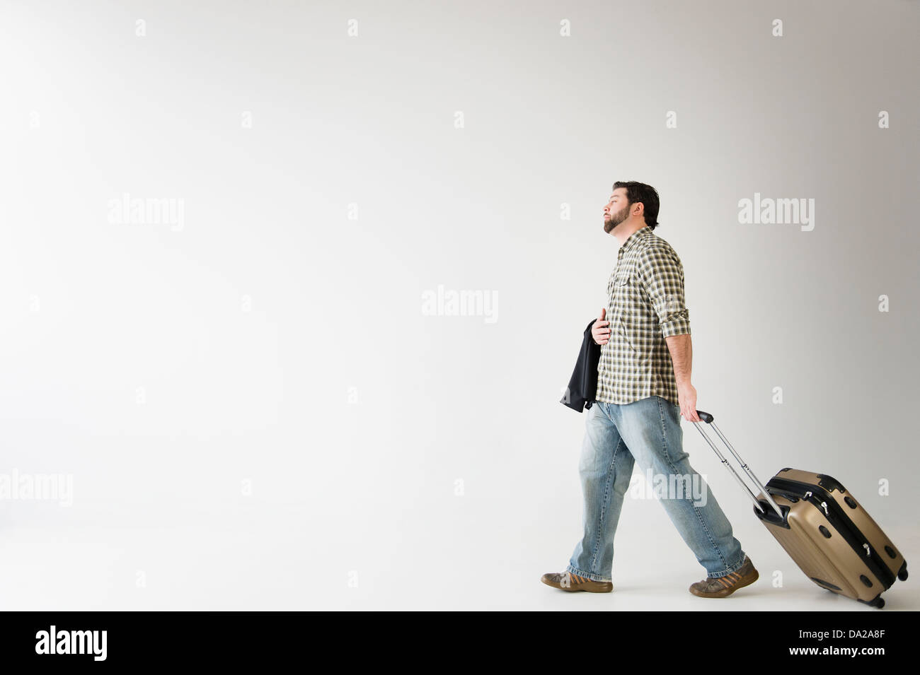 Walk away with suitcase hi-res stock photography and images - Alamy