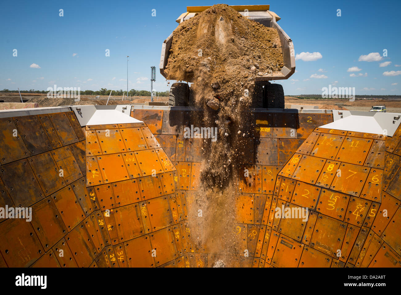 Truck Dump Hopper on mine site Stock Photo - Alamy