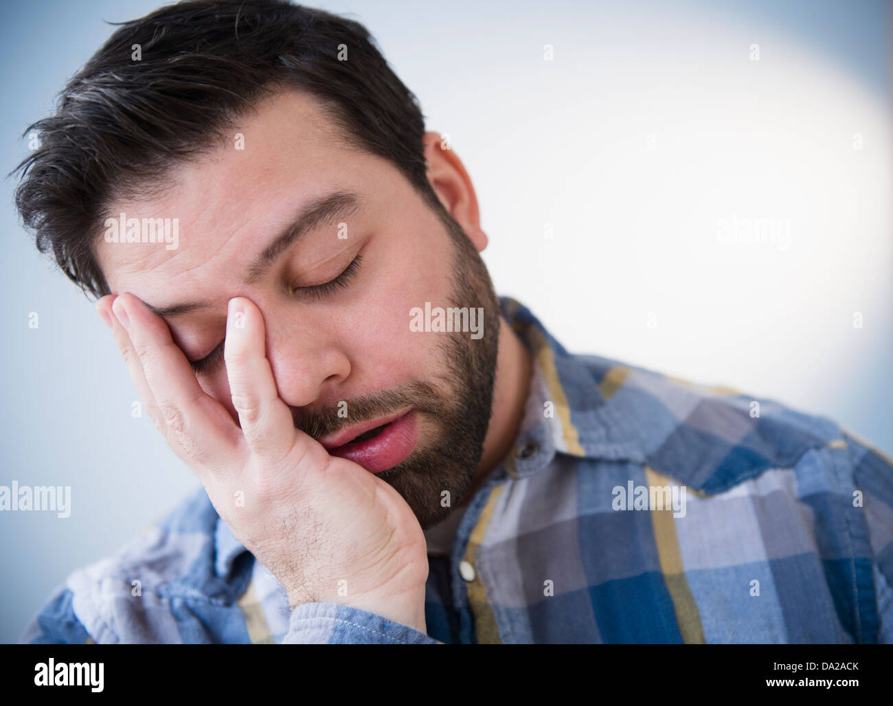 Portrait of tired man Stock Photo - Alamy