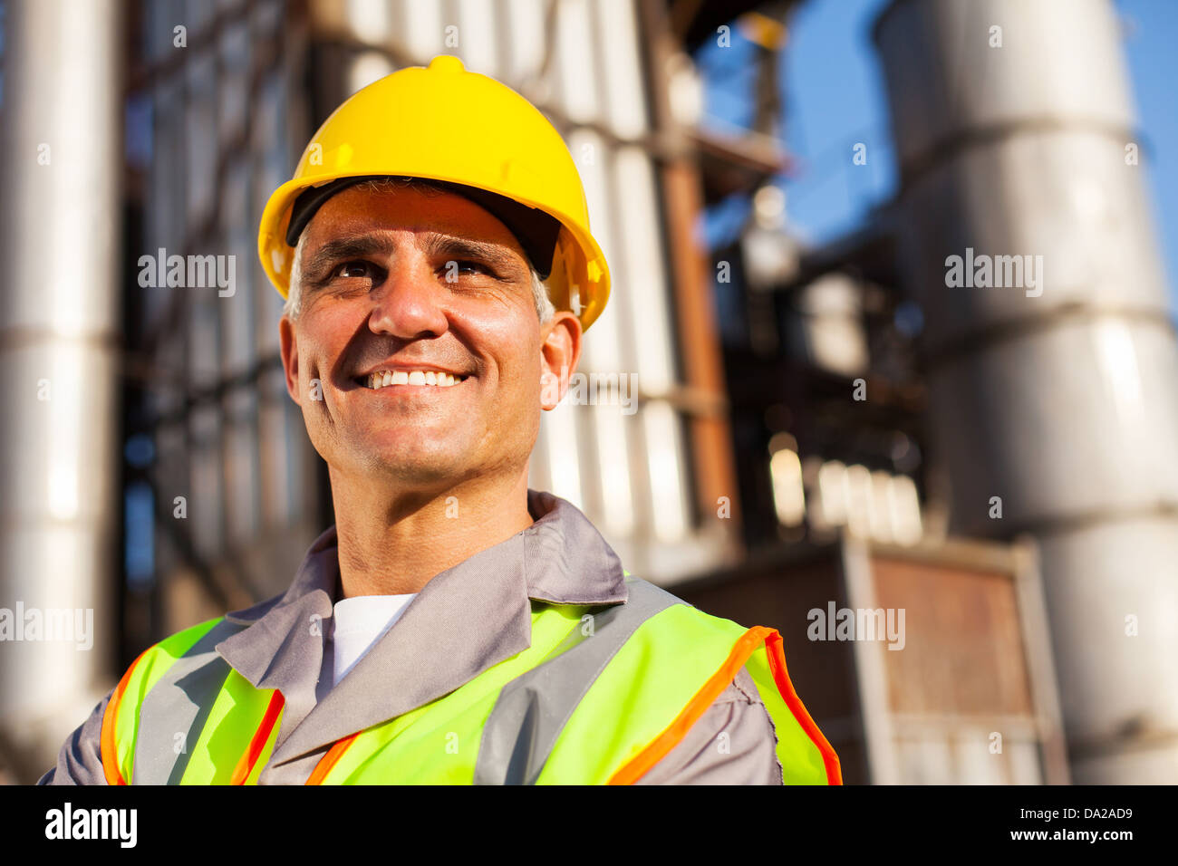 senior fuel refinery worker closeup portrait inside plant Stock Photo ...