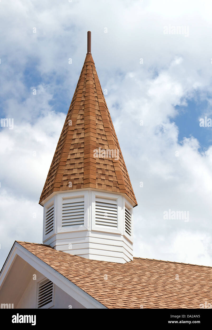 Detail of spire roof tower on building against cloudy sky Stock Photo ...