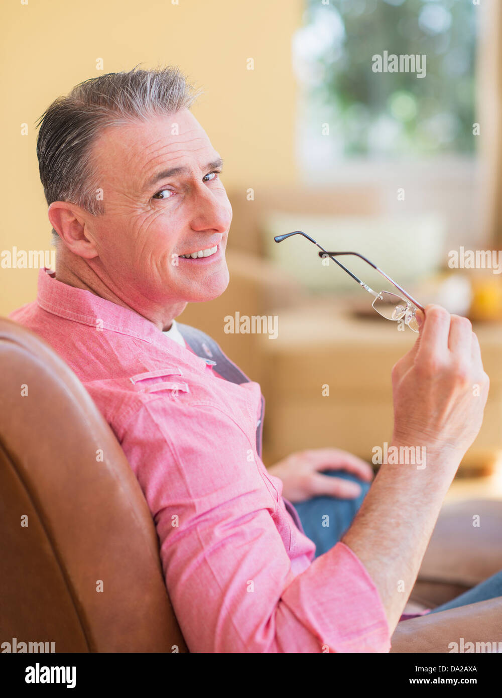 Man holding spectacles hi-res stock photography and images - Alamy
