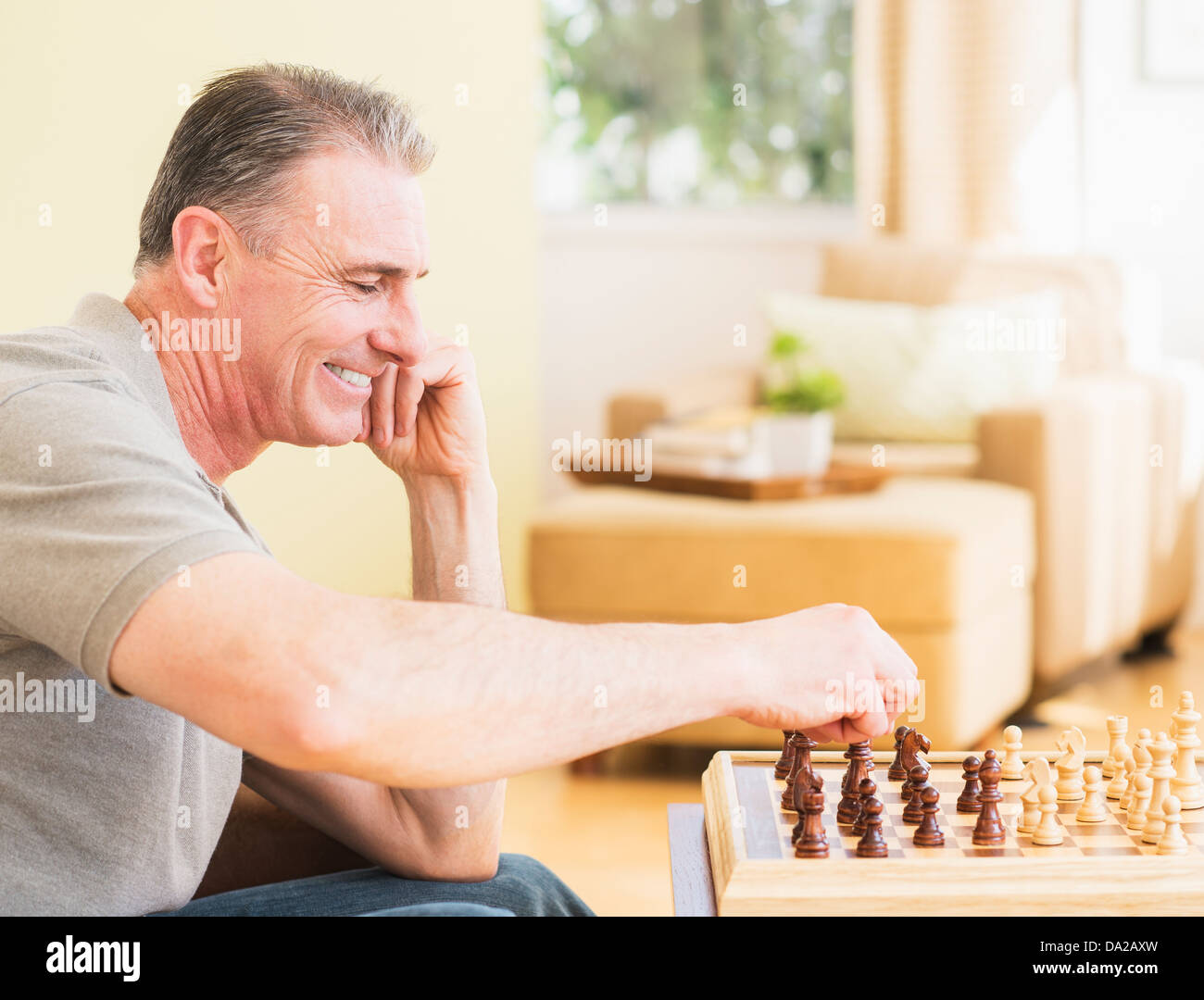 Ma playing chess Stock Photo - Alamy