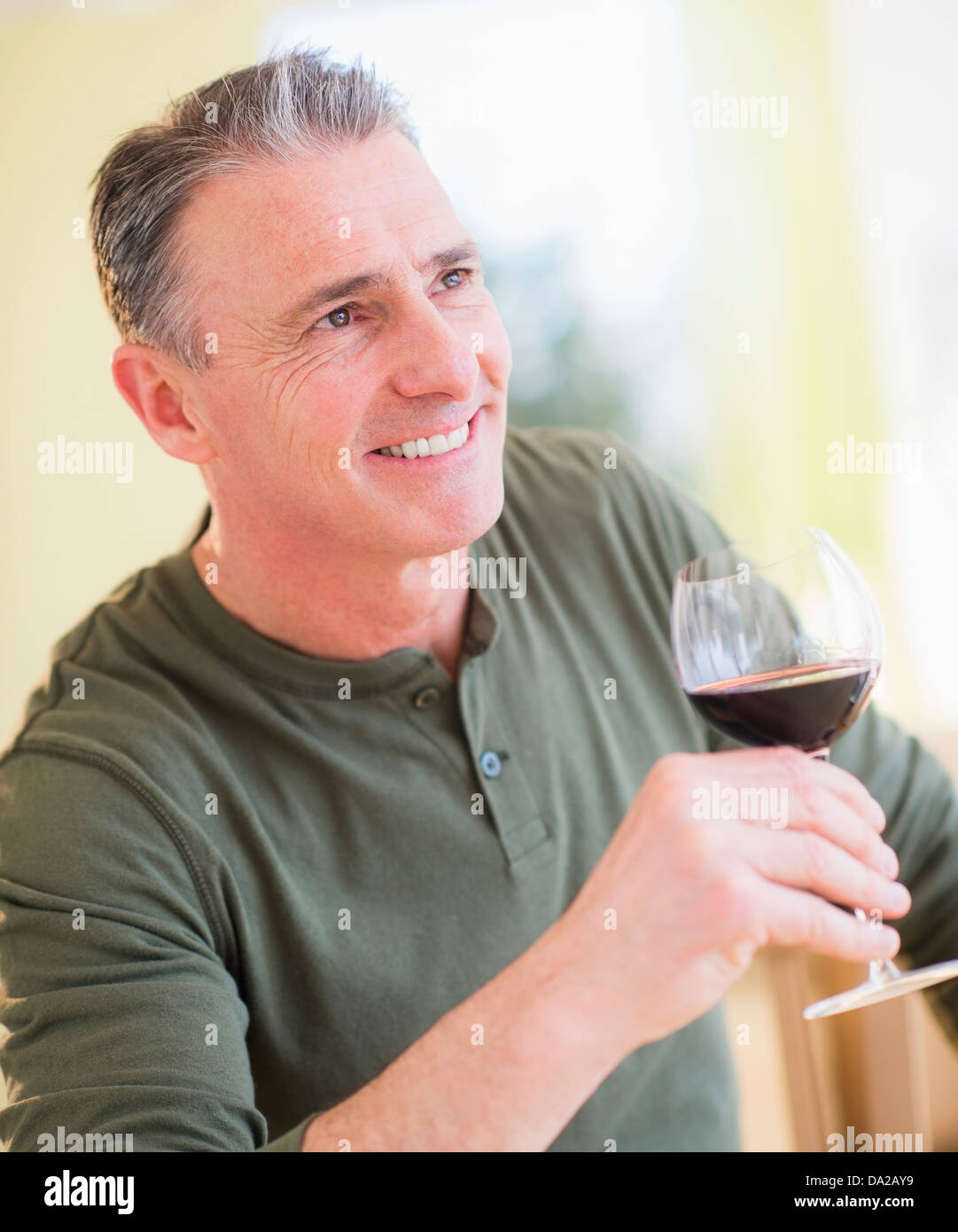 Portrait of man drinking red wine Stock Photo - Alamy