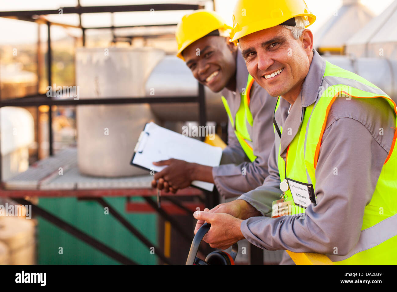 two oil and chemical industry technicians in plant Stock Photo - Alamy