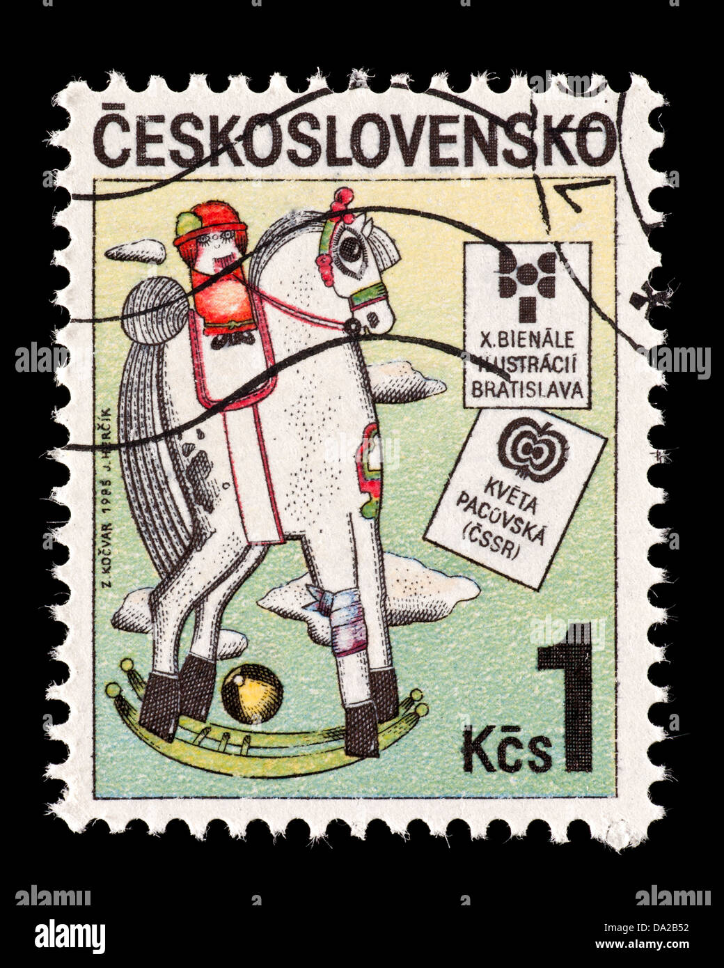 Postage stamp from Czechoslovakia depicting a boy riding a toy rocking ...