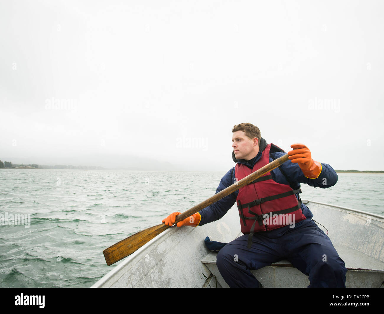 Man paddling boat hi-res stock photography and images - Alamy