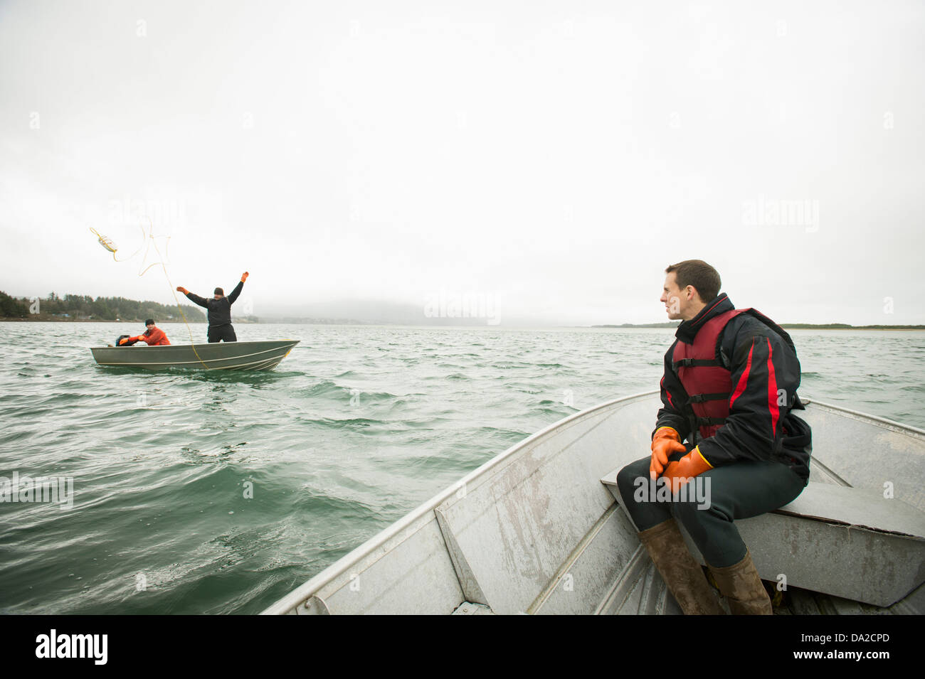 USA, Oregon, Rockaway Beach, People crabbing Stock Photo - Alamy