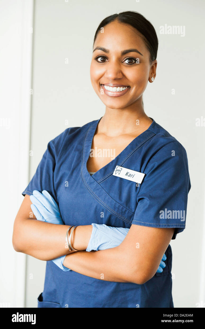 Portrait of smiling female nurse Stock Photo - Alamy