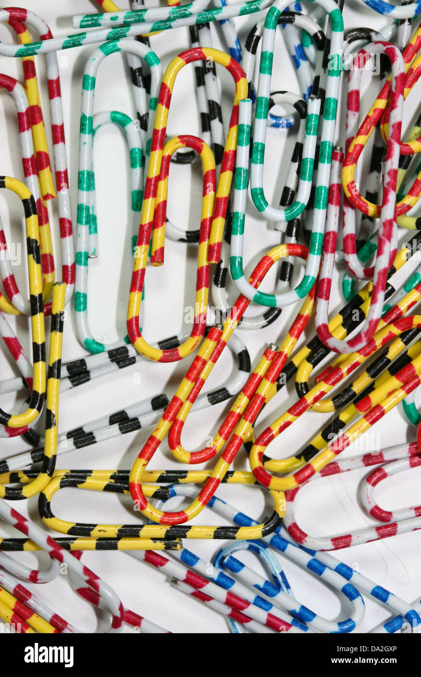 Bundle of of paper clip in different color , closeup shot on white ...