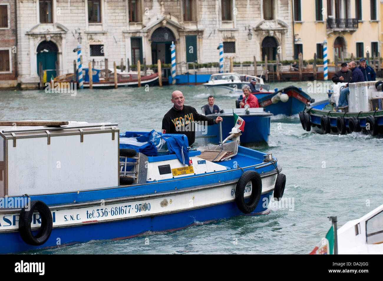 A series of portraits of the helmsmen who ply the water and transport ...