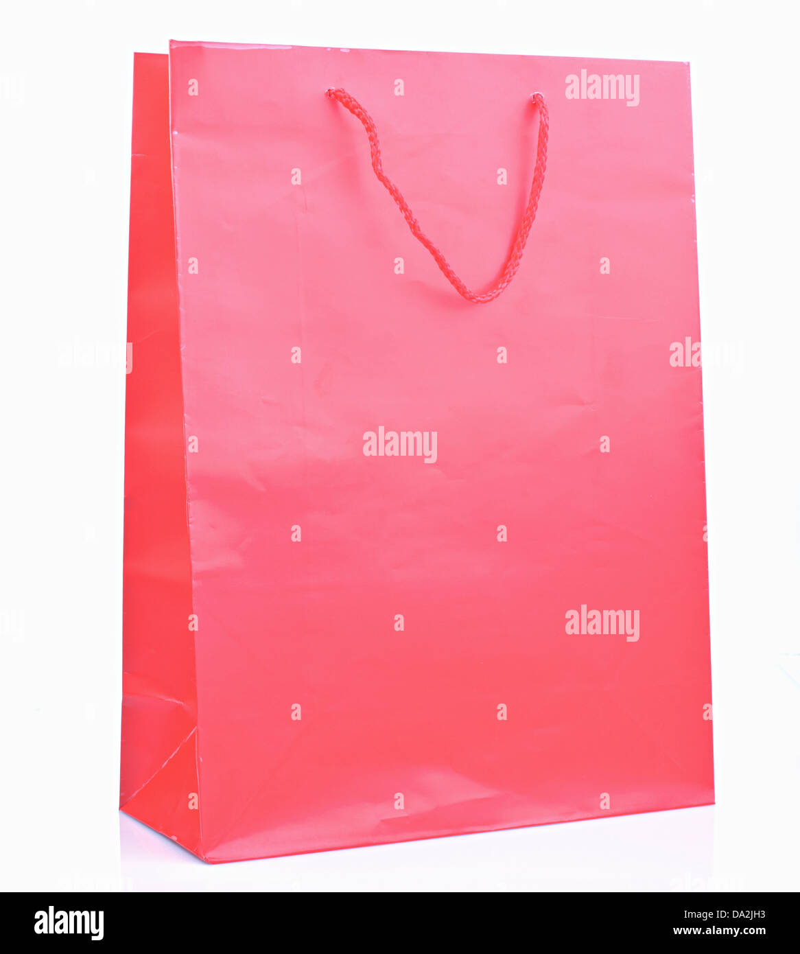 Red paper bag on white background Stock Photo - Alamy