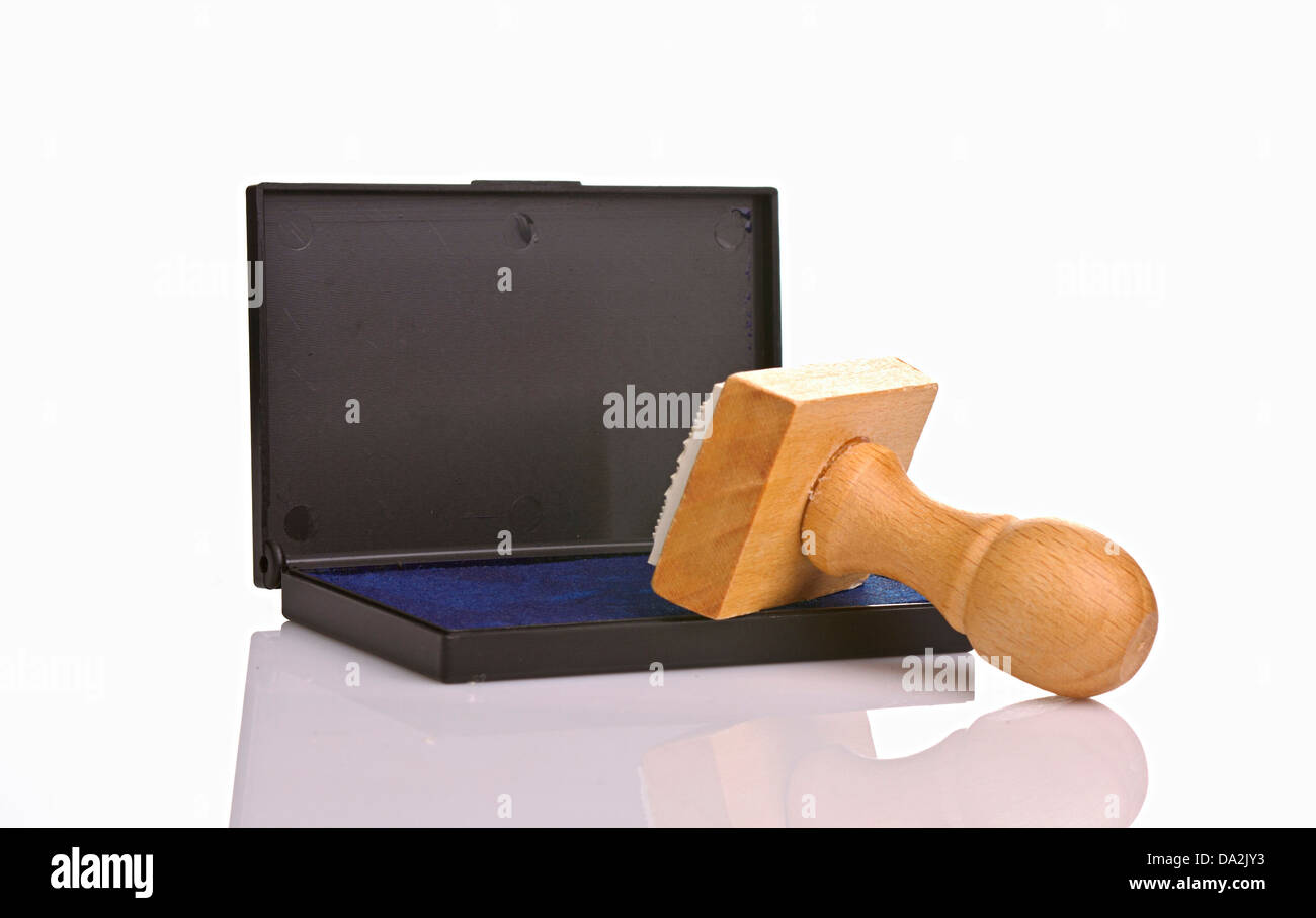Wooden stamp isolated on white background Stock Photo - Alamy