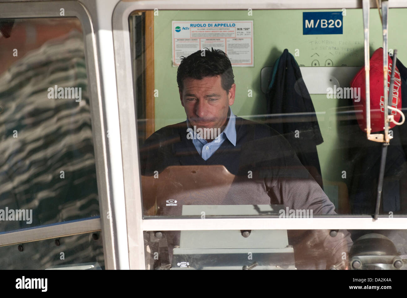 A series of portraits of the helmsmen who ply the water and transport ...