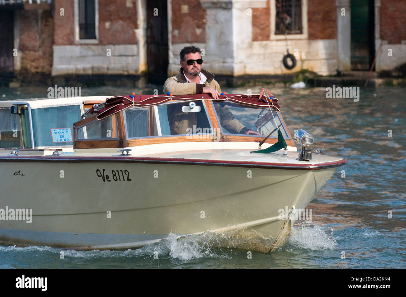 A series of portraits of the helmsmen who ply the water and transport ...